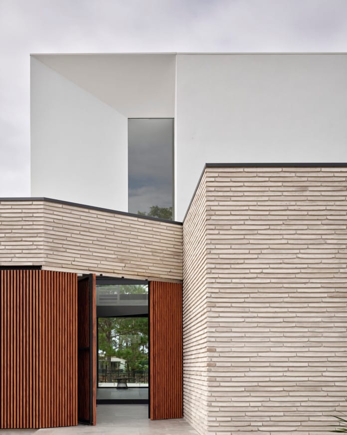 Stratum on Hope Island. Timeless Brick Home | PGH Bricks & Pavers